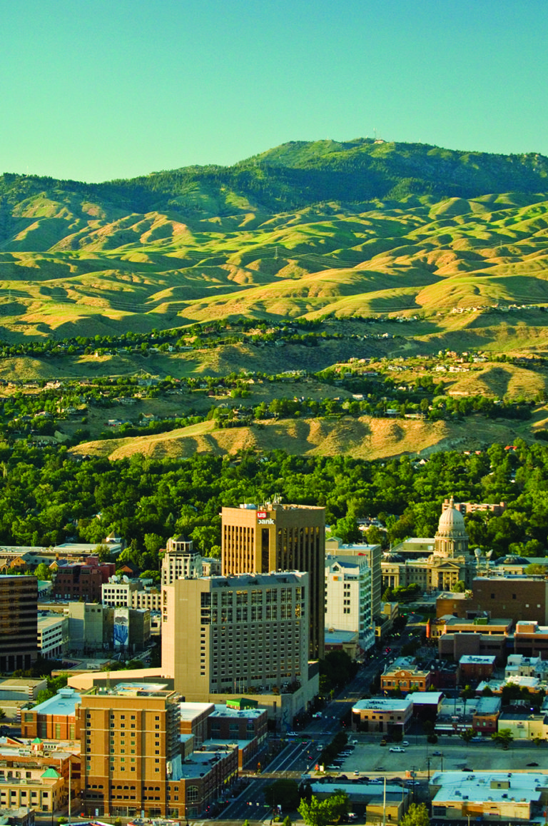 Aerial. Boise, Idaho downtown with Bogus Basin and mountains beyond ...